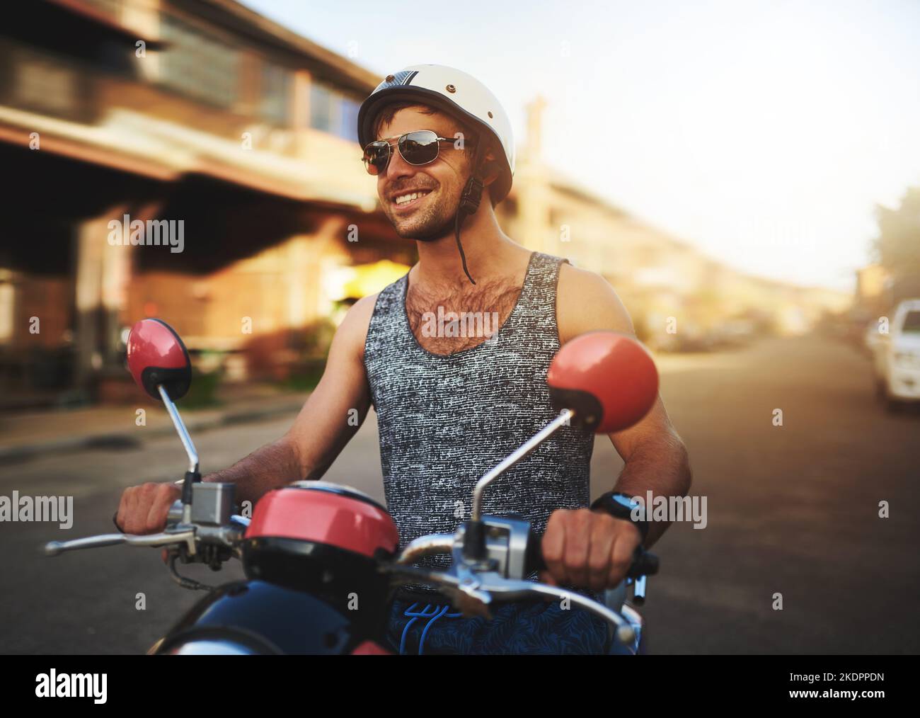 You dont need a reason to take a ride. a young man taking a drive ...