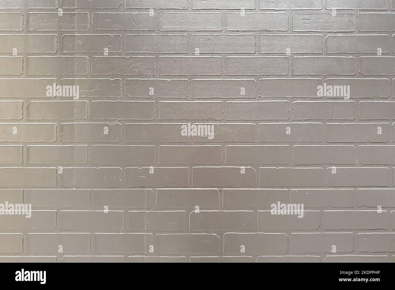 Gray painted wall with brick wall texture. Glossy finish paint. Full ...