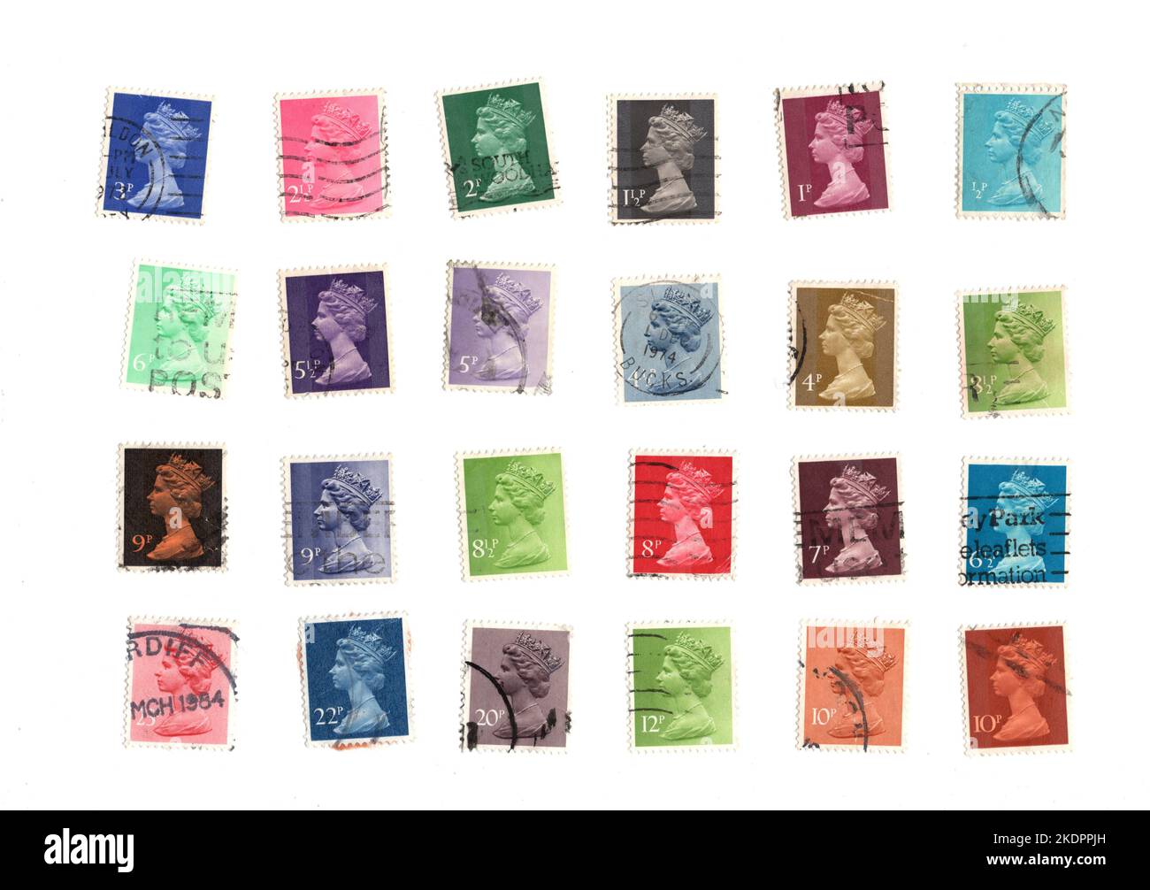 A montage of vintage postage stamps from the United Kingdom on a white ...