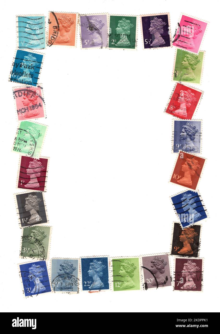 A montage of vintage postage stamps from the United Kingdom on a white ...