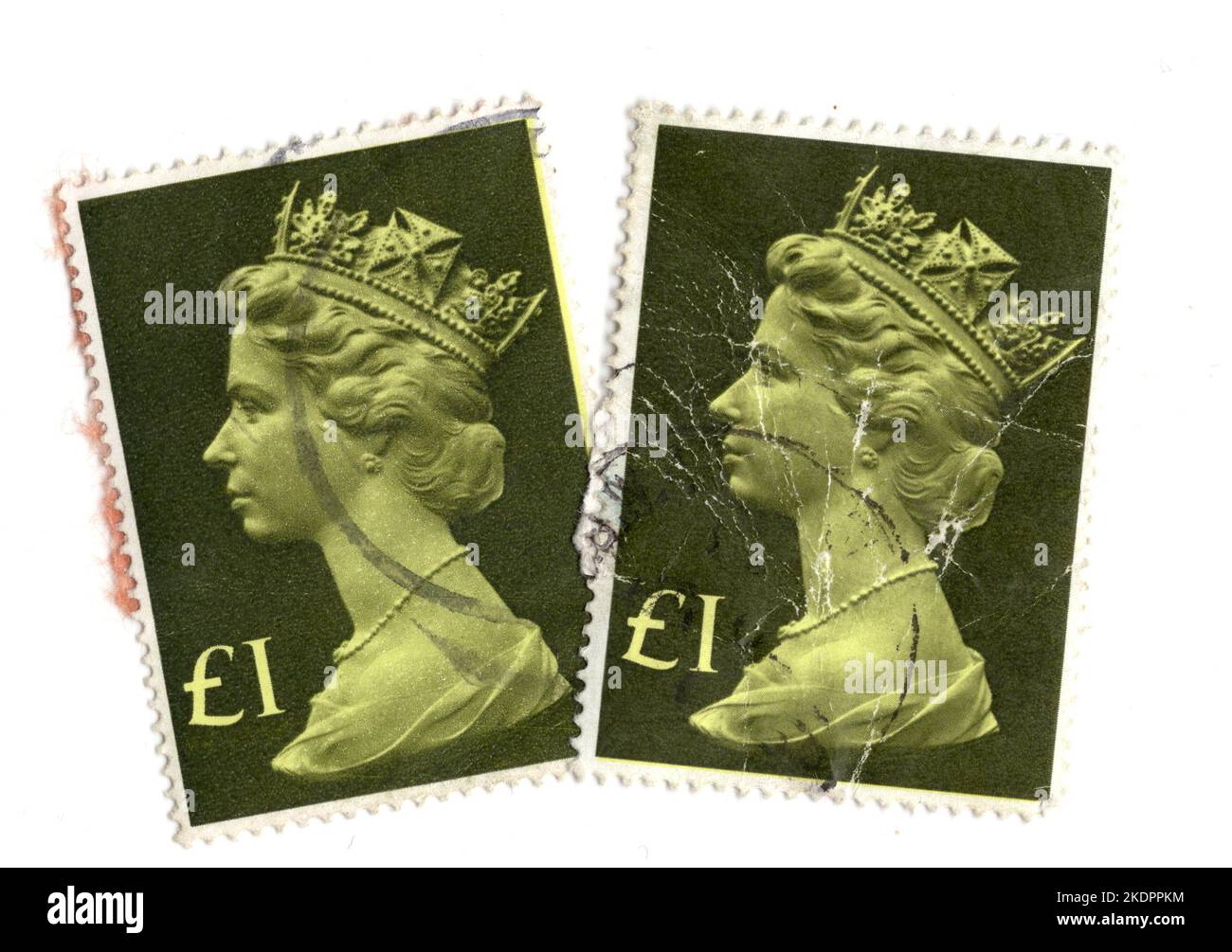 A montage of vintage postage stamps from the United Kingdom on a white ...