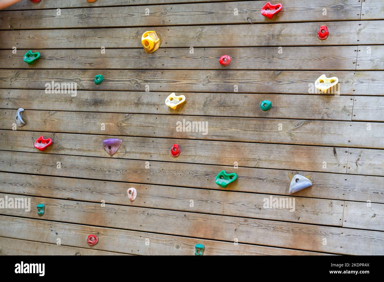 Close-up of a climbing wall in an outdoor park Stock Photo - Alamy