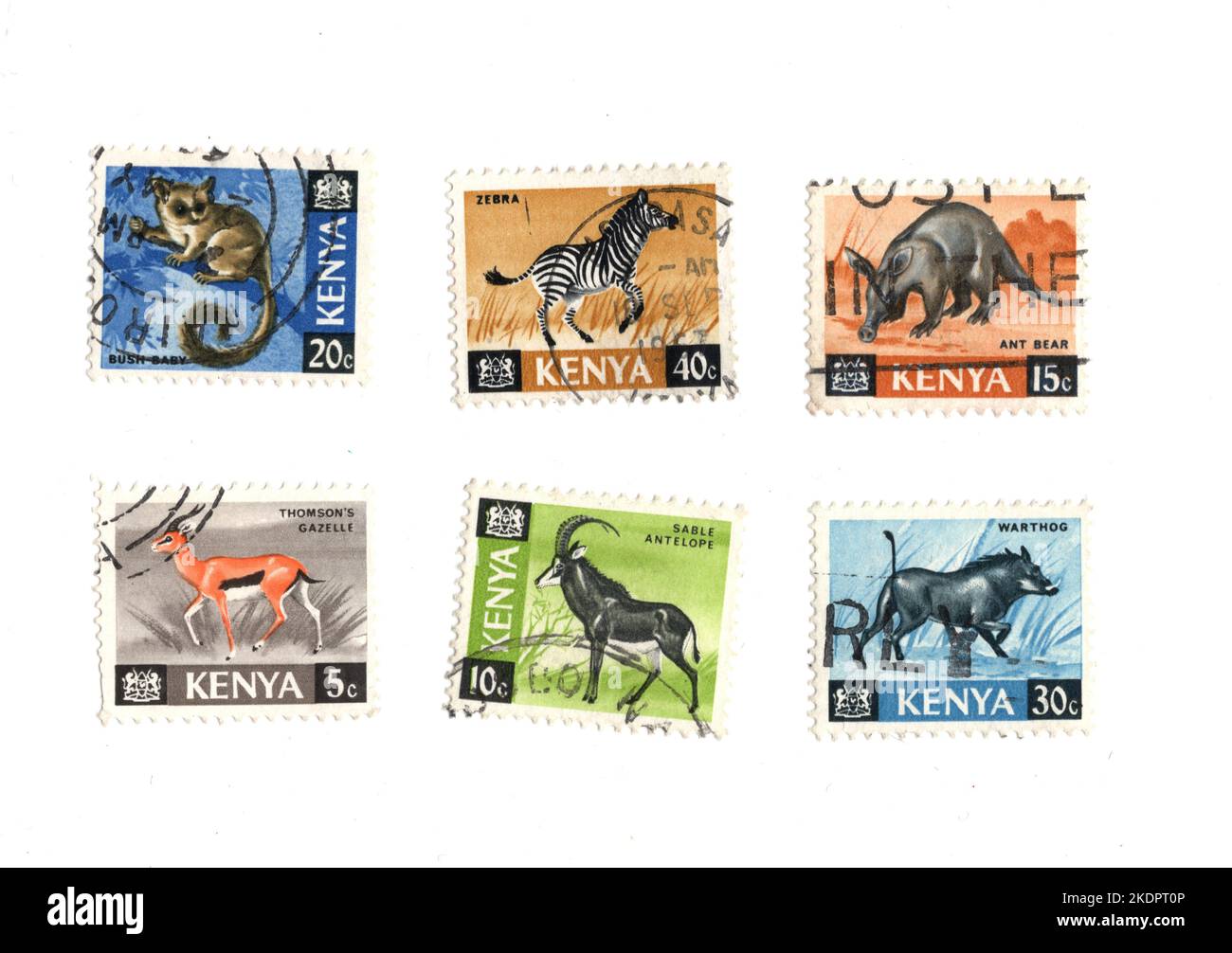 A montage of vintage postage stamps from Kenya on a white background ...