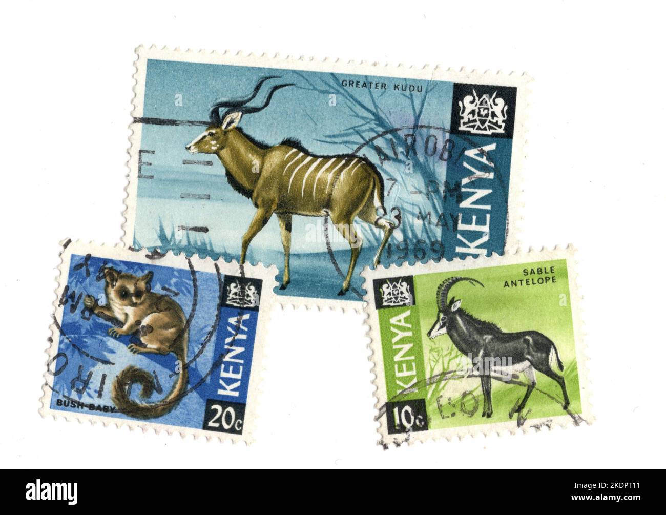 A montage of vintage postage stamps from Kenya on a white background ...