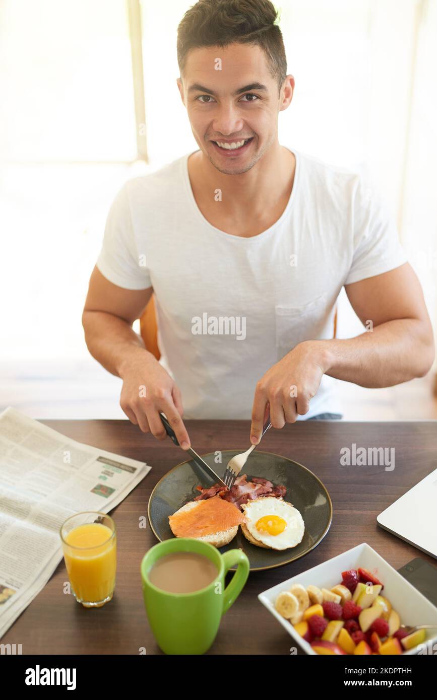 I prefer a homemade breakfast. a bachelor enjoying breakfast at home ...