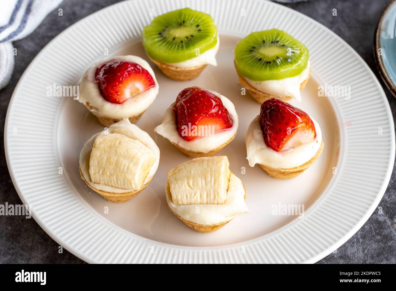 Tartlet dessert on a dark background. Traditional french cuisine ...