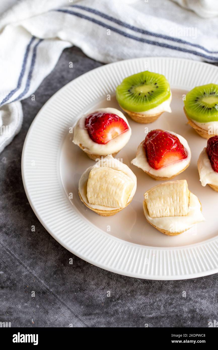 Tartlet dessert on a dark background. Traditional french cuisine ...