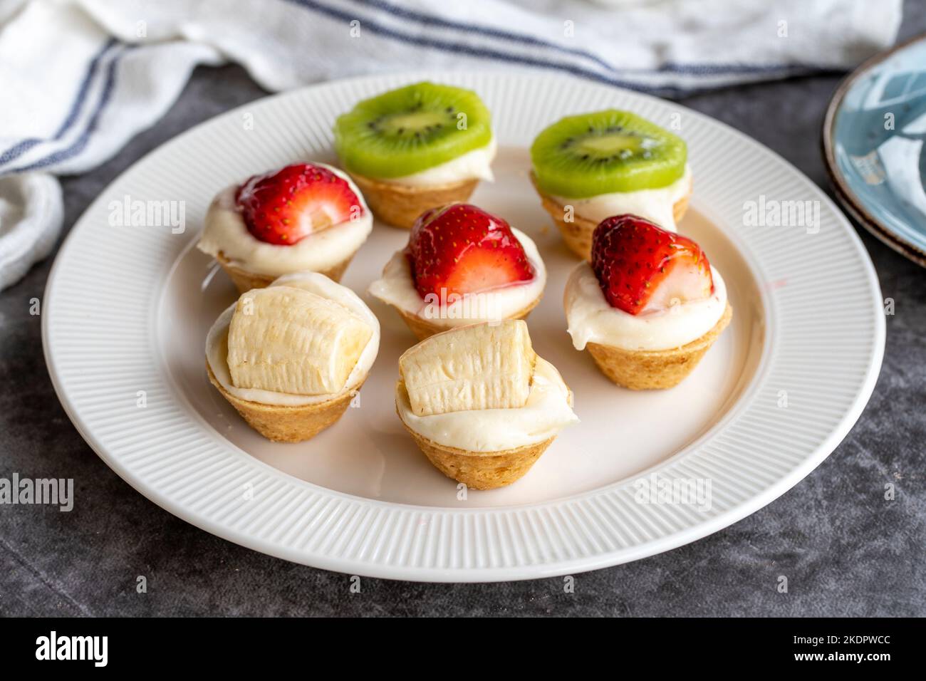 Tartlet dessert on a dark background. Traditional french cuisine ...