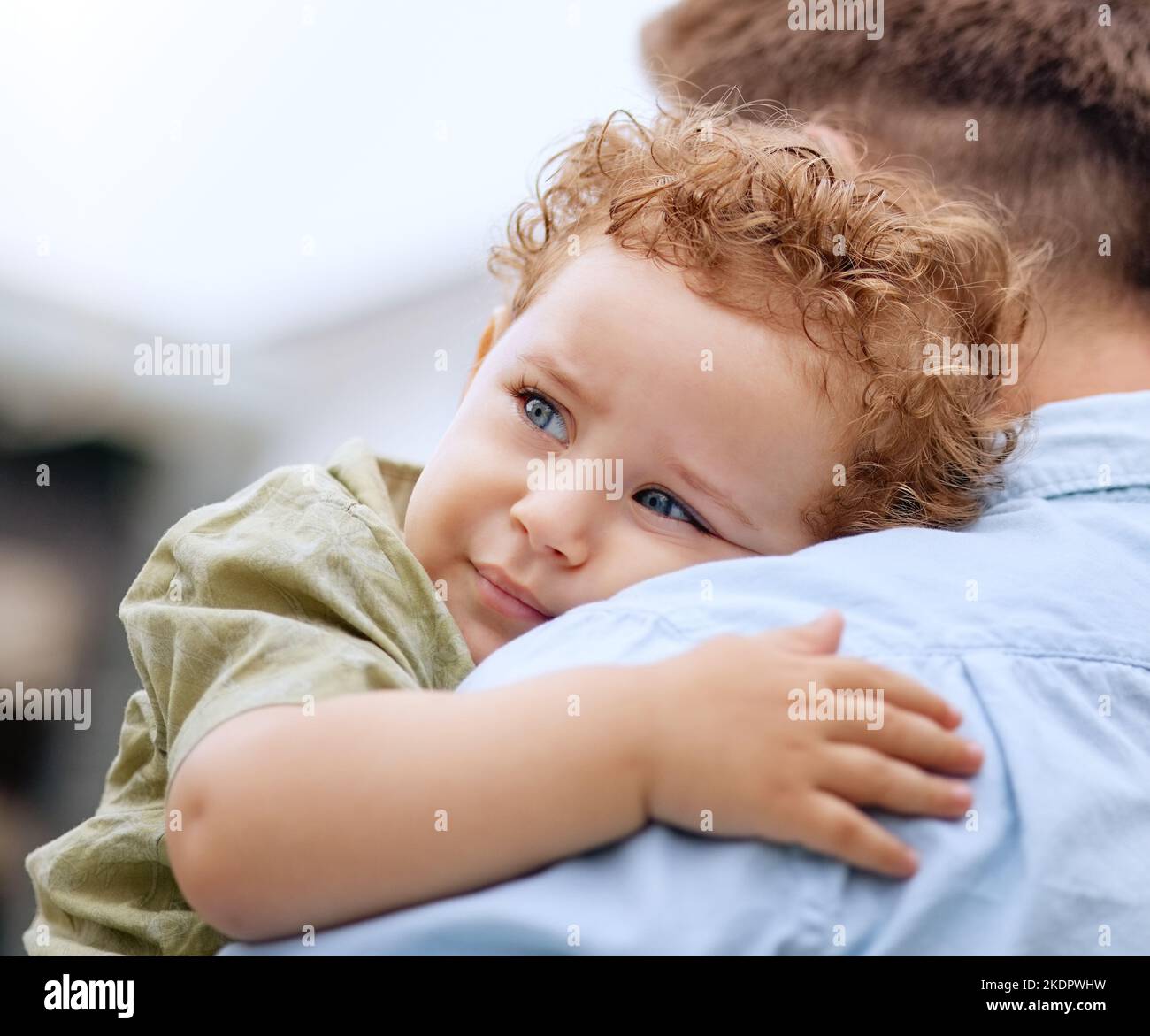 Baby, sad and closeup on dad shoulder for care, bonding and love ...