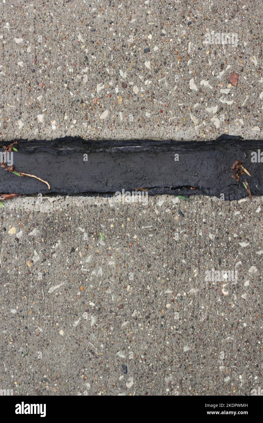 Minimalist view of a simple black line crossing a typical concrete ...