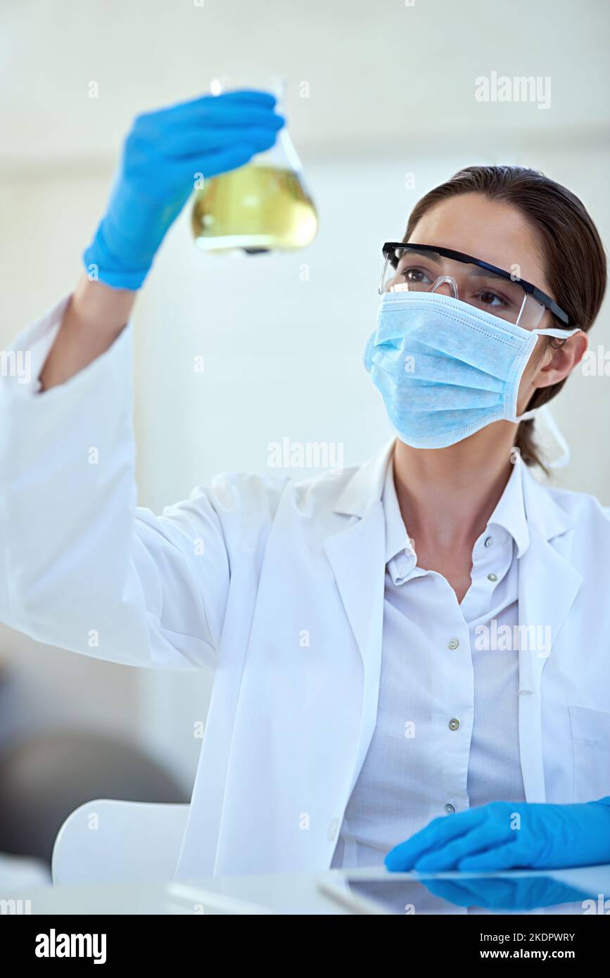 Ensuring her findings are as accurate as possible. a female scientist ...