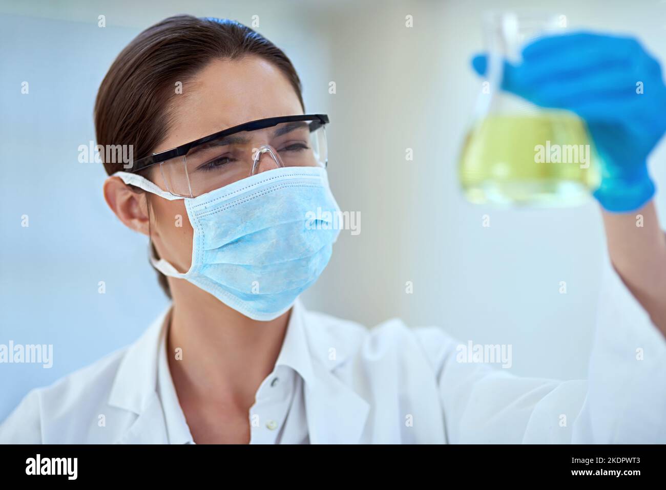 Its essential to have an objective eye in science. a female scientist ...