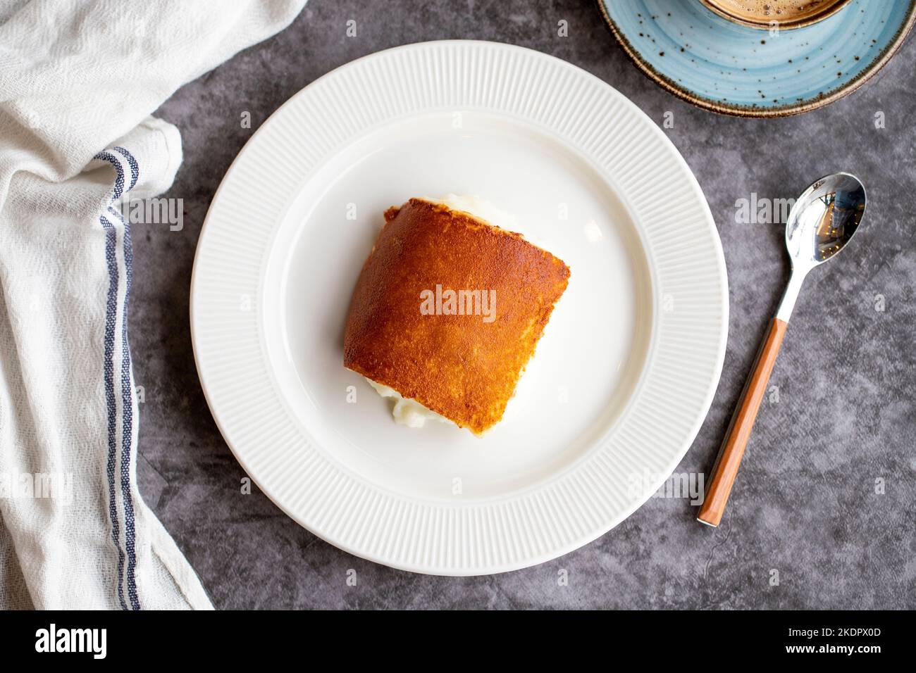 Kazandibi dessert on a dark background. Milky dessert. Traditional ...