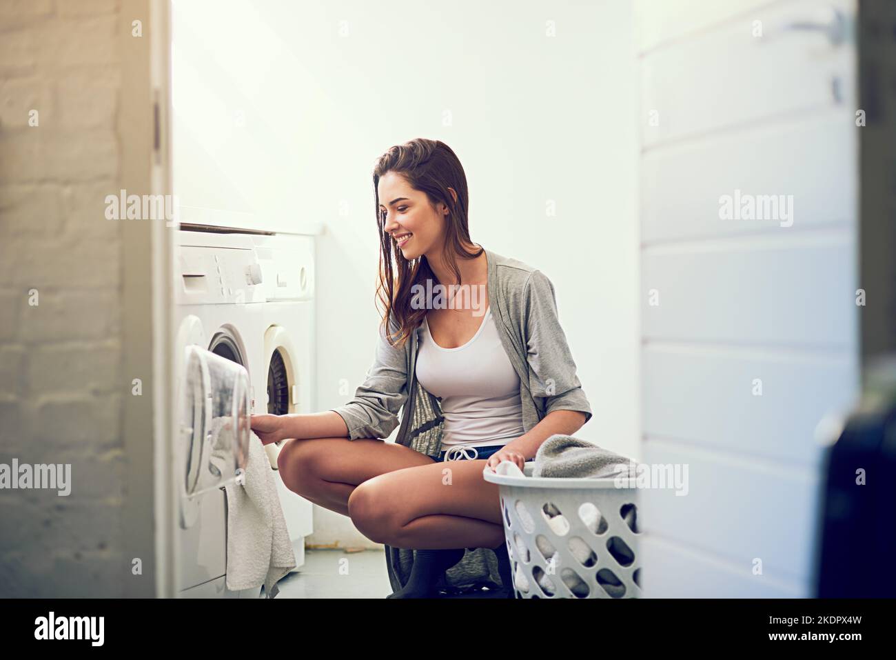 Woman fresh laundry house hi-res stock photography and images - Alamy