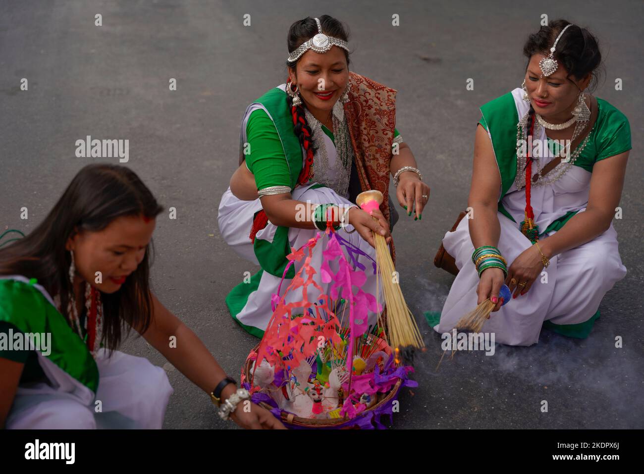 Kathmandu, Nepal. 8th Nov, 2022. Women from the Tharu community perform prayer rituals during ...