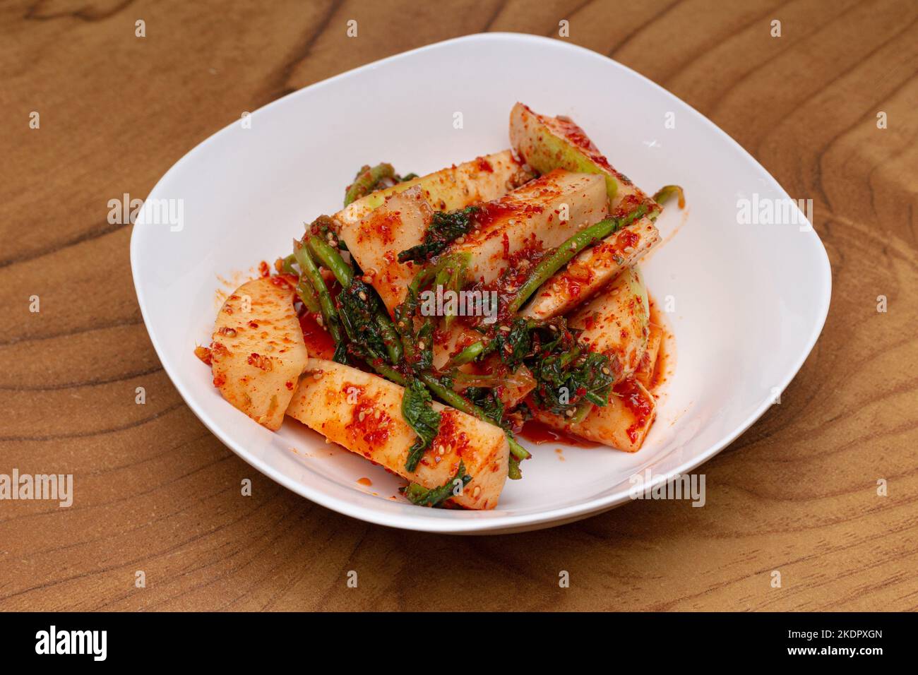 Delicious-looking radish kimchi seasoned with spicy chilli powder Stock ...