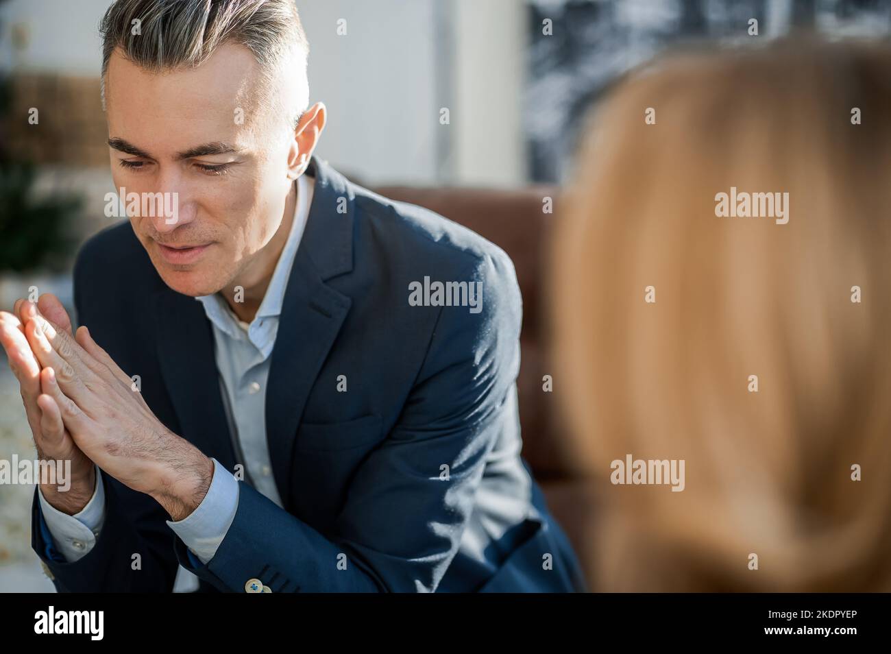 Man sitting at the psychologist and speaking about his problems Stock ...