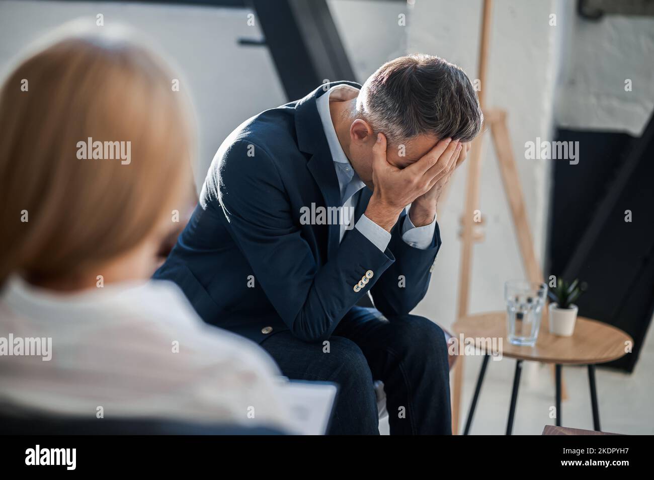 Man sitting at the psychologist and speaking about his problems Stock ...