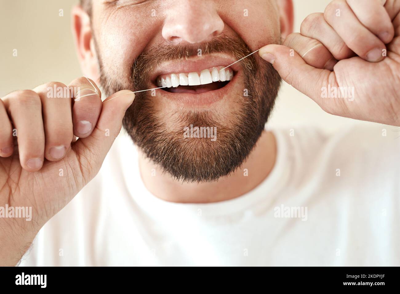 I love the feeling of clean teeth. an unrecognizable man going through ...