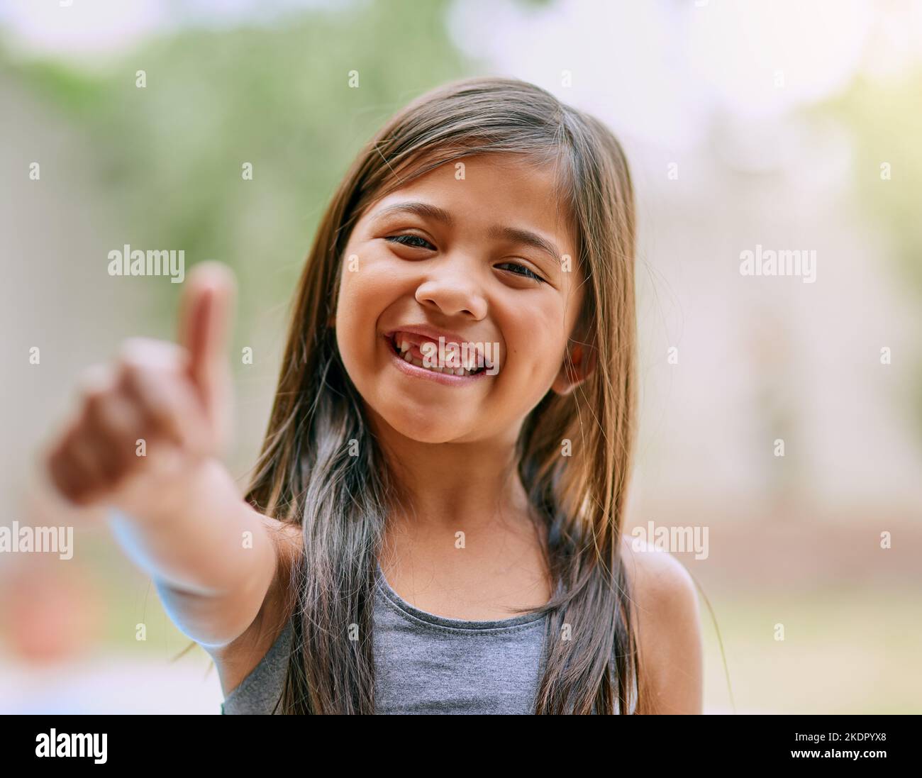 Childhood should be filled with big smiles and happy days. Portrait of ...