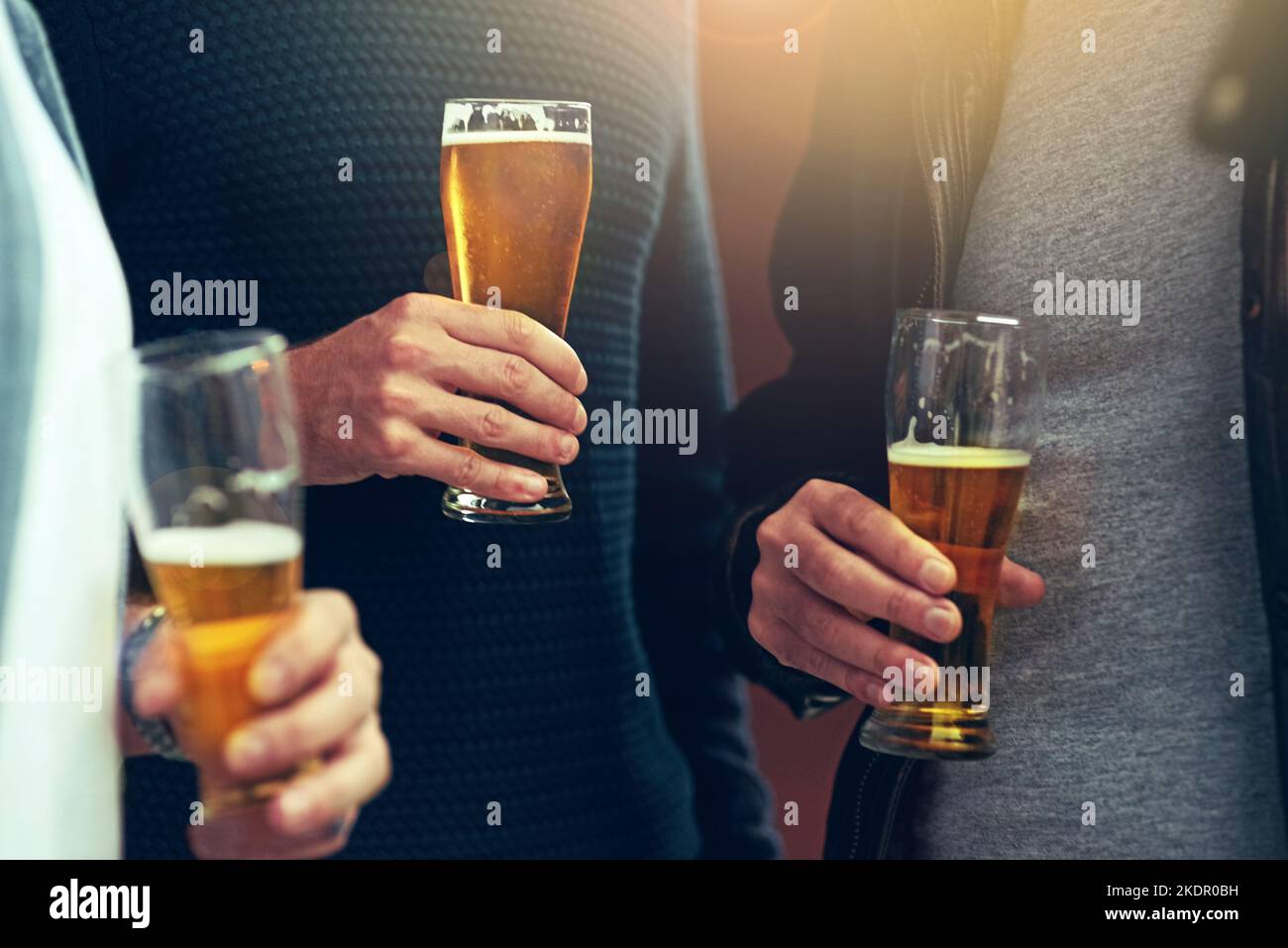 Friends dont let friends drink alone. a group of unidentifiable friends ...