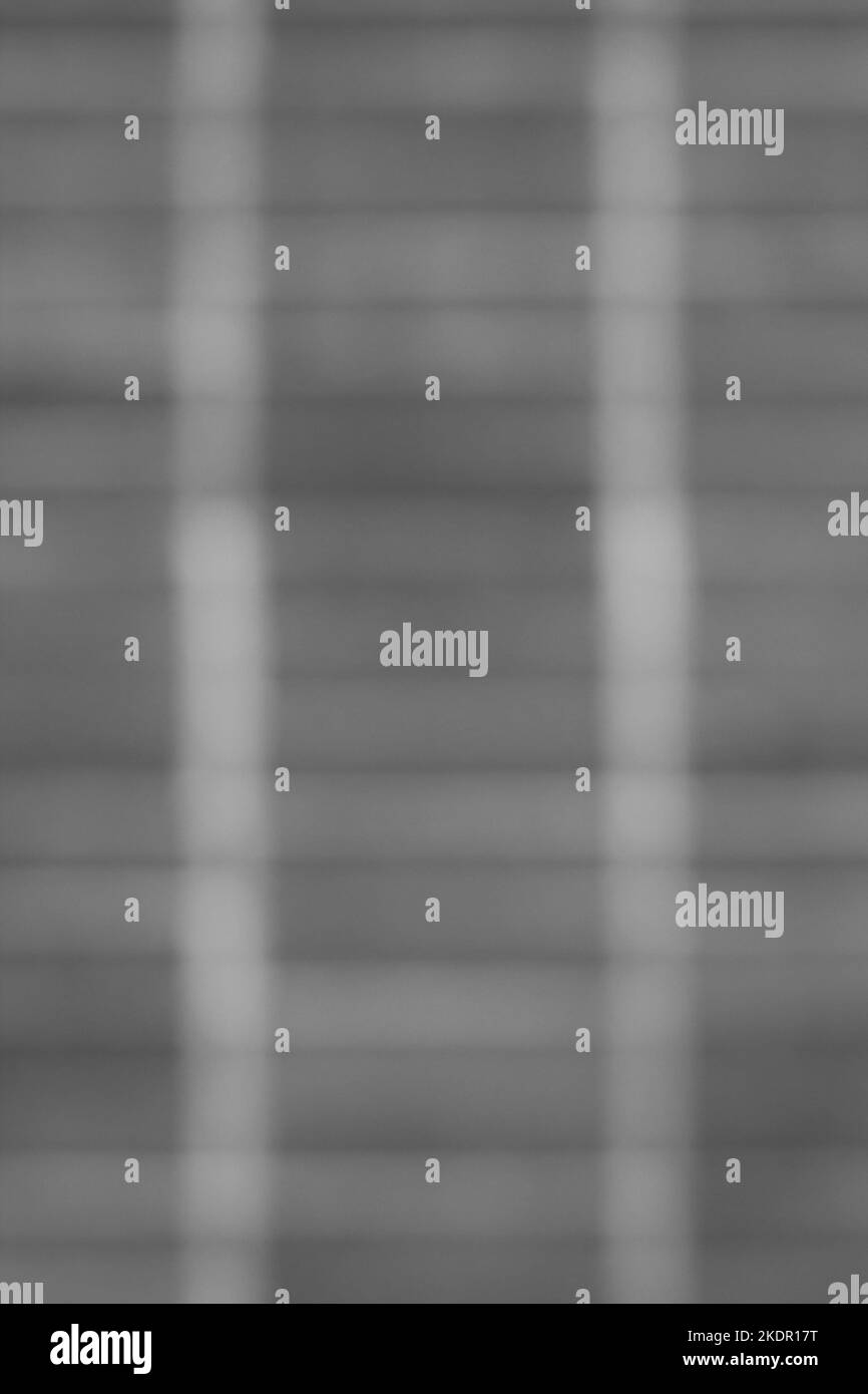 Blurry dreamy view of a repeating pattern of lines and a rectangular ...