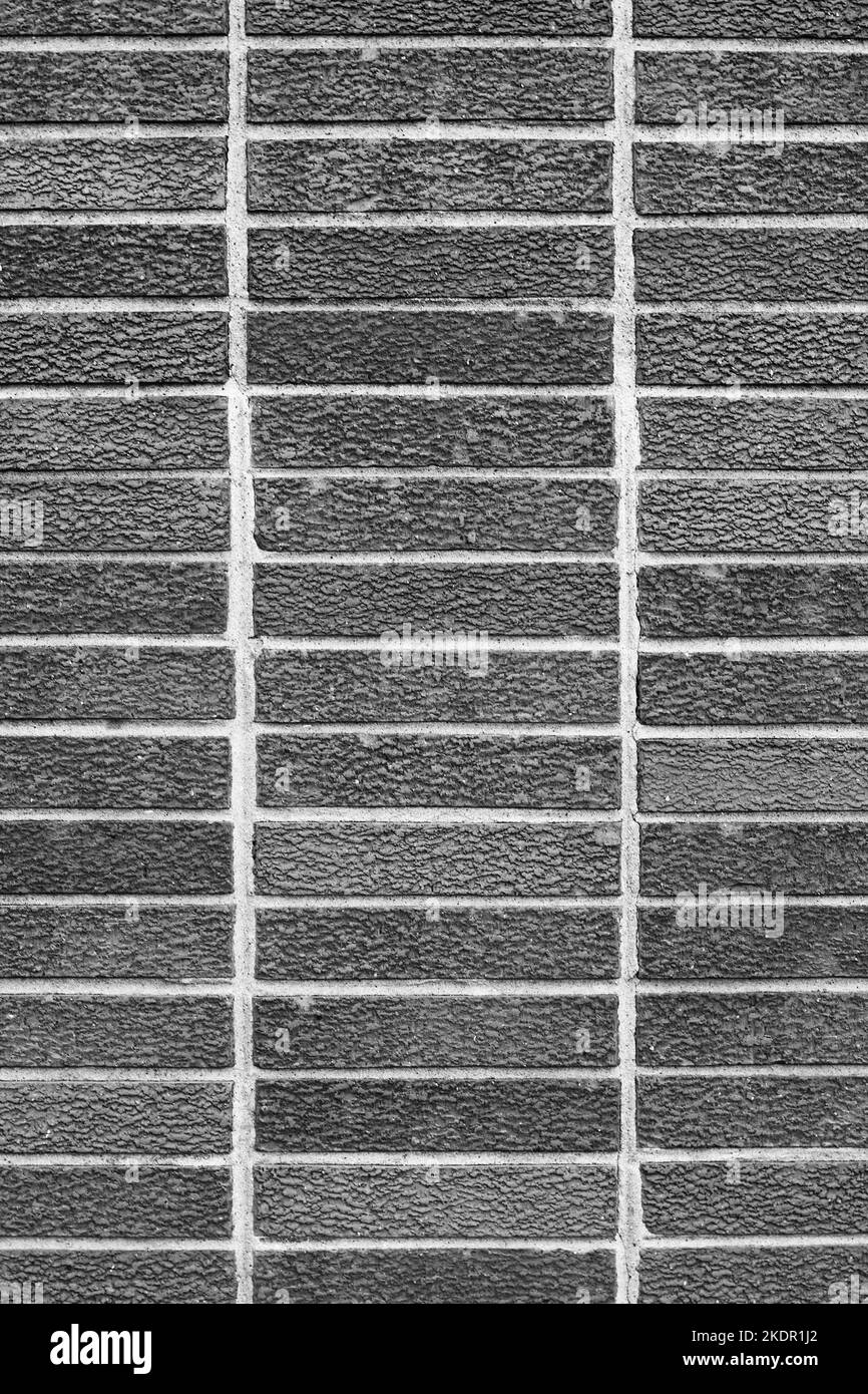 Full frame view of a rectangular brick wall with an even repeating ...
