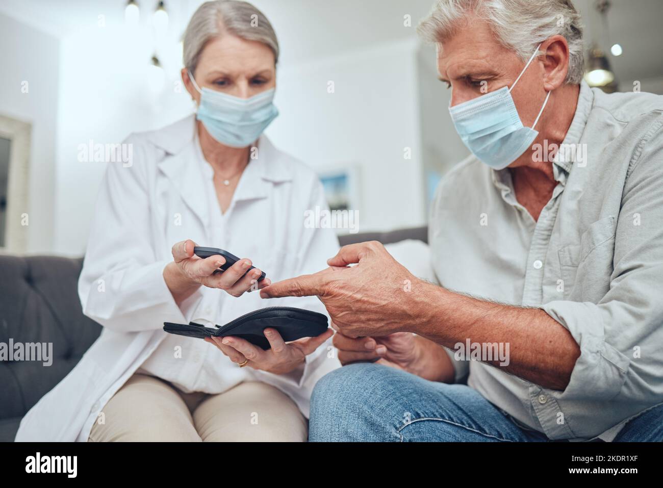 Covid, doctor or man in diabetes test on glucometer strip in nursing ...