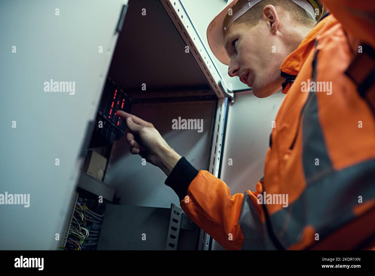 Engineering the future. a young engineer working with complicated ...