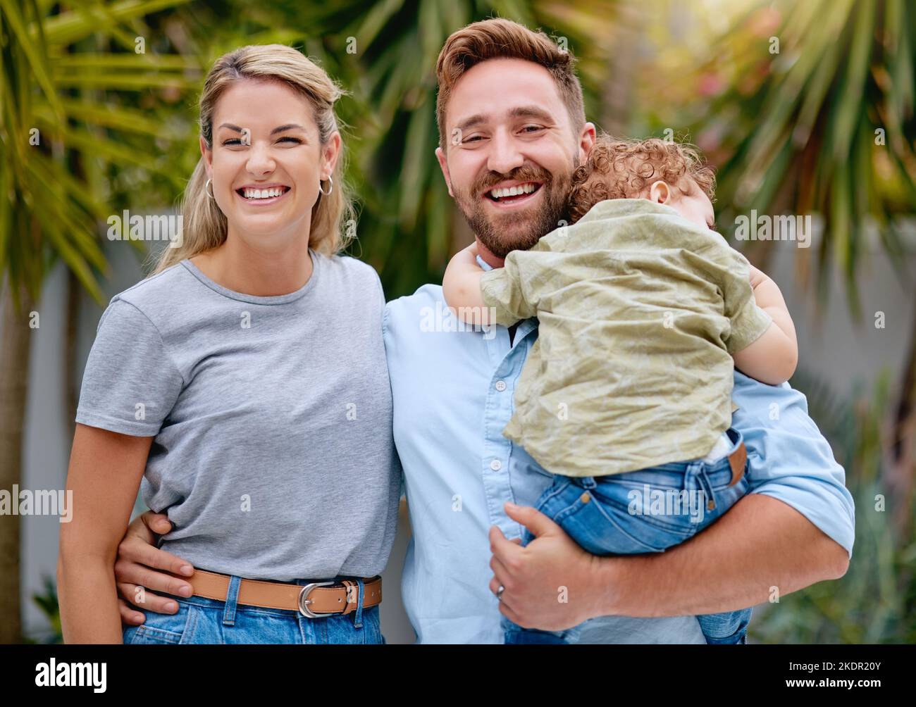 Happy family hug, love and care in park, garden and nature for ...