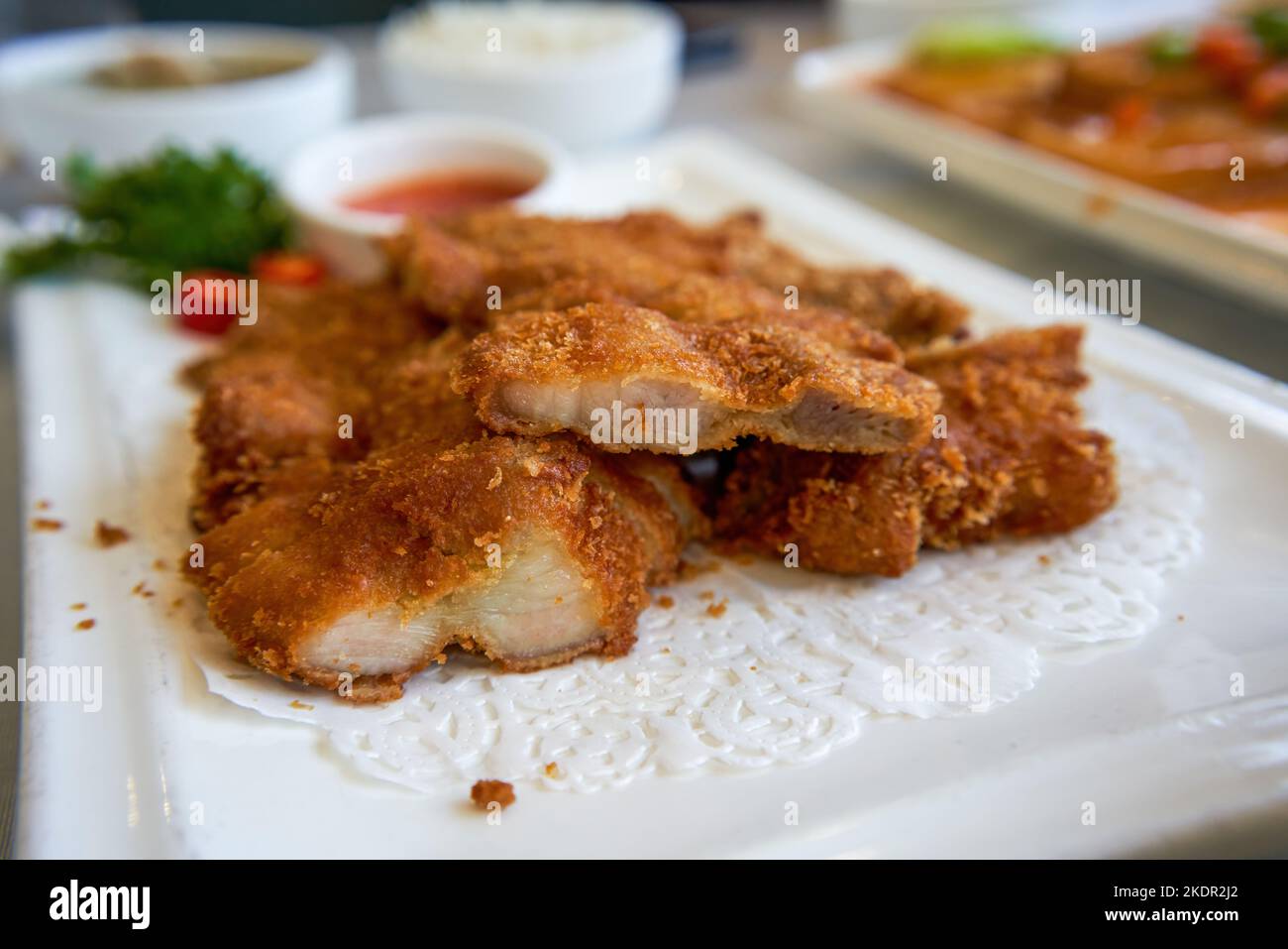 Deep fried pork tenderloin hi-res stock photography and images - Alamy