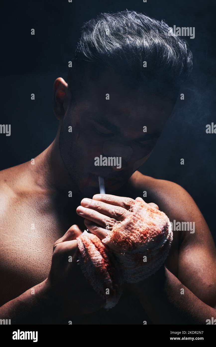 Boxer man, fight and blood of a boxing fighter with cigarette after ...