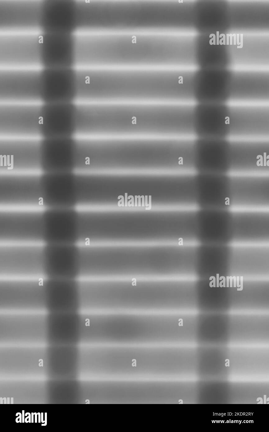 Blurry dreamy view of a repeating pattern of lines and a rectangular ...