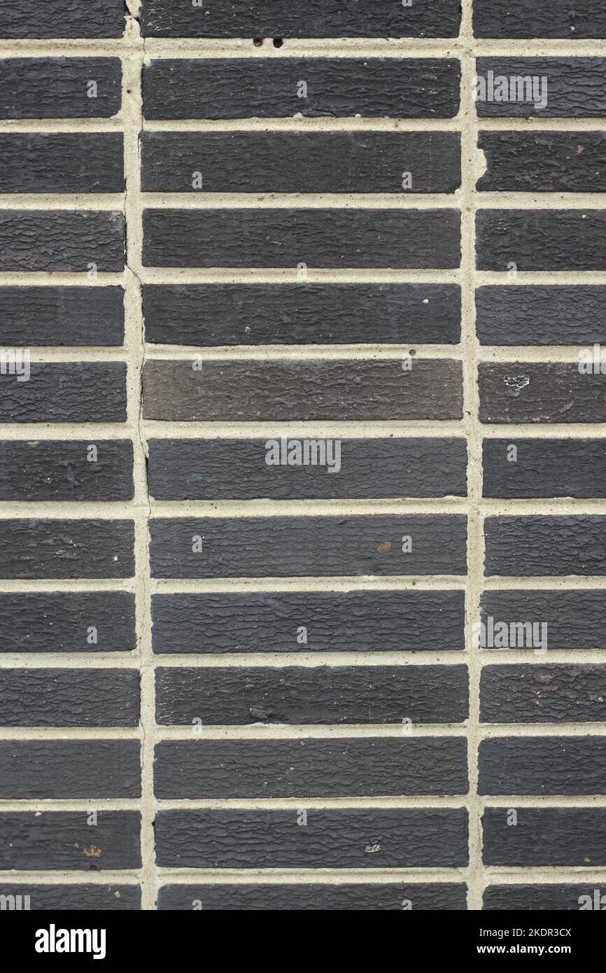 Full frame view of a rectangular brick wall with an even repeating ...