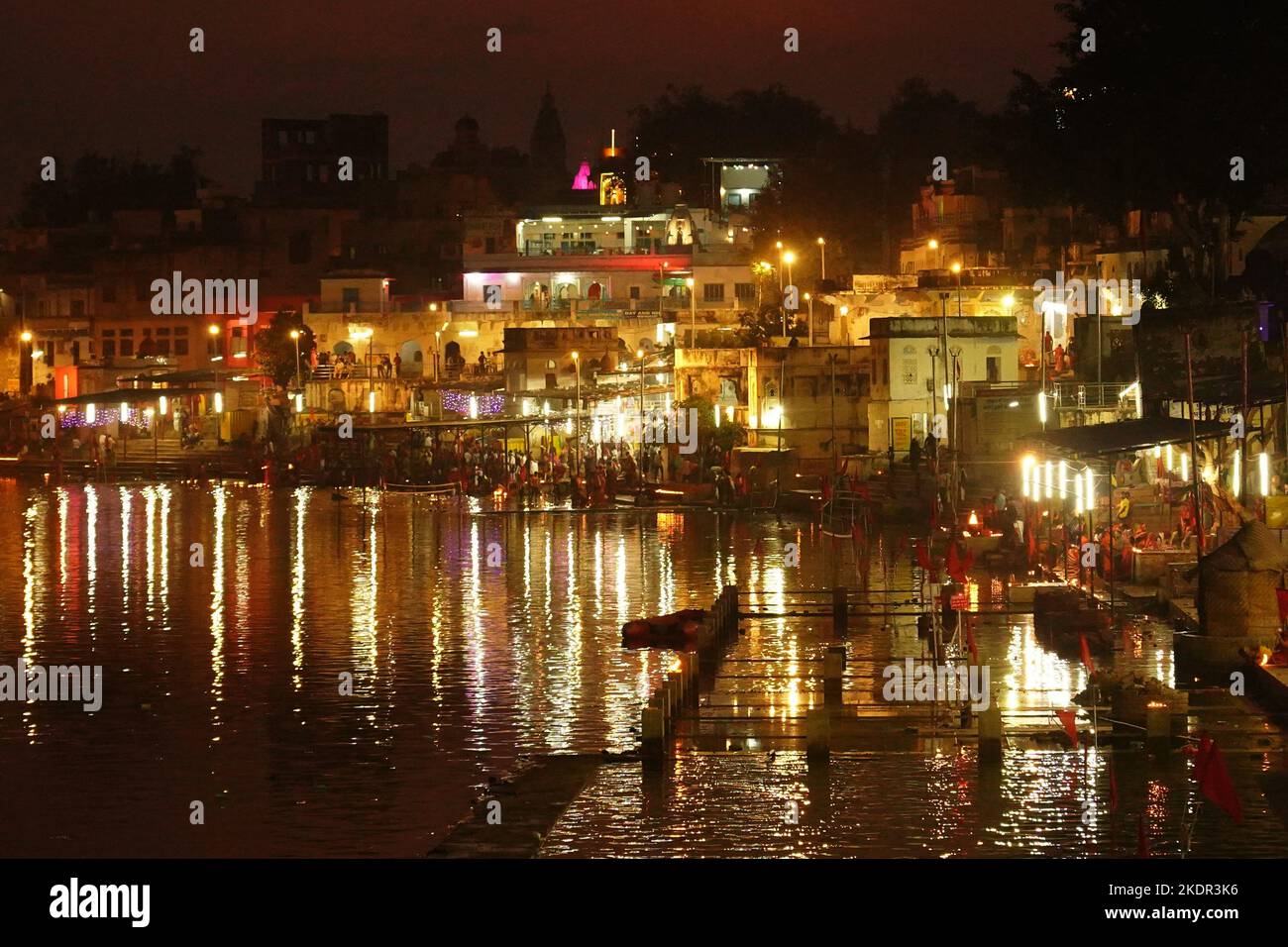 Indian Hindu devotee lights up traditional oil lamps to celebrate Dev ...