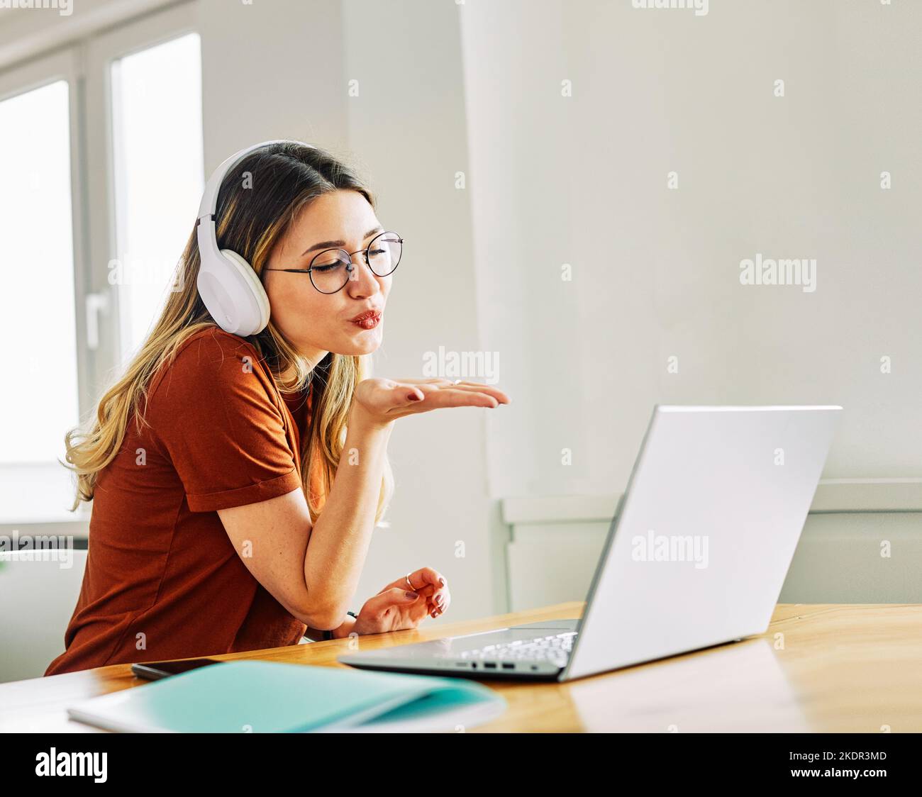 laptop woman computer headphone technology call video communication ...