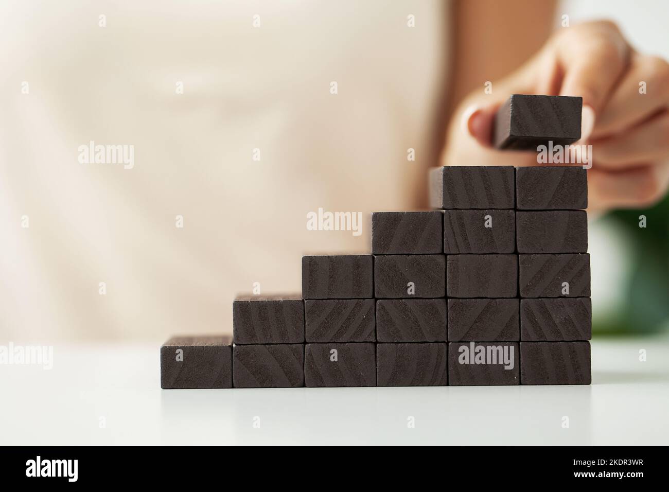 Woman hand putting and stacking blank wooden cubes on desk Stock Photo ...