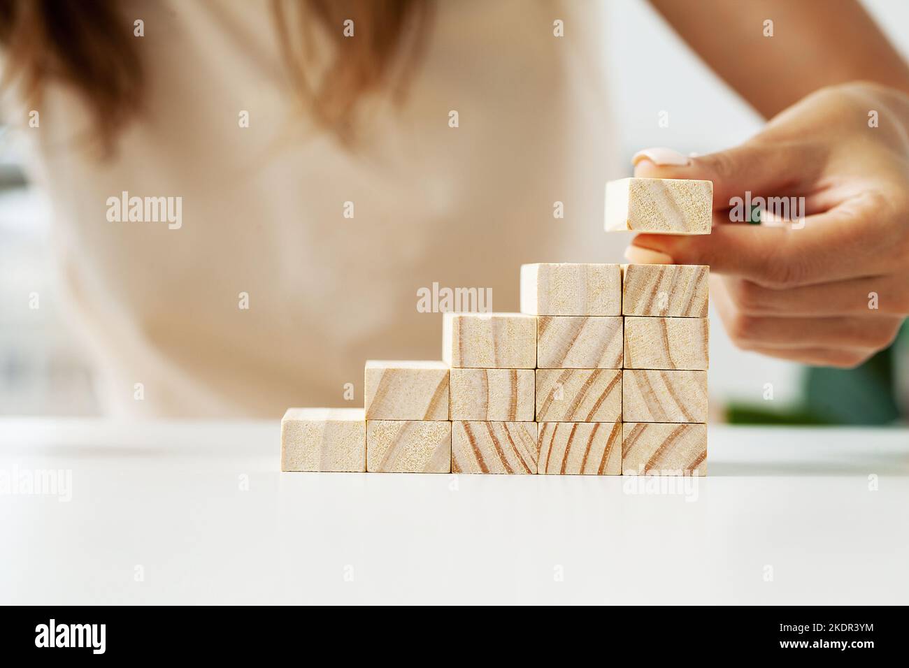 Putting stacking blank wooden cubes hi-res stock photography and images ...