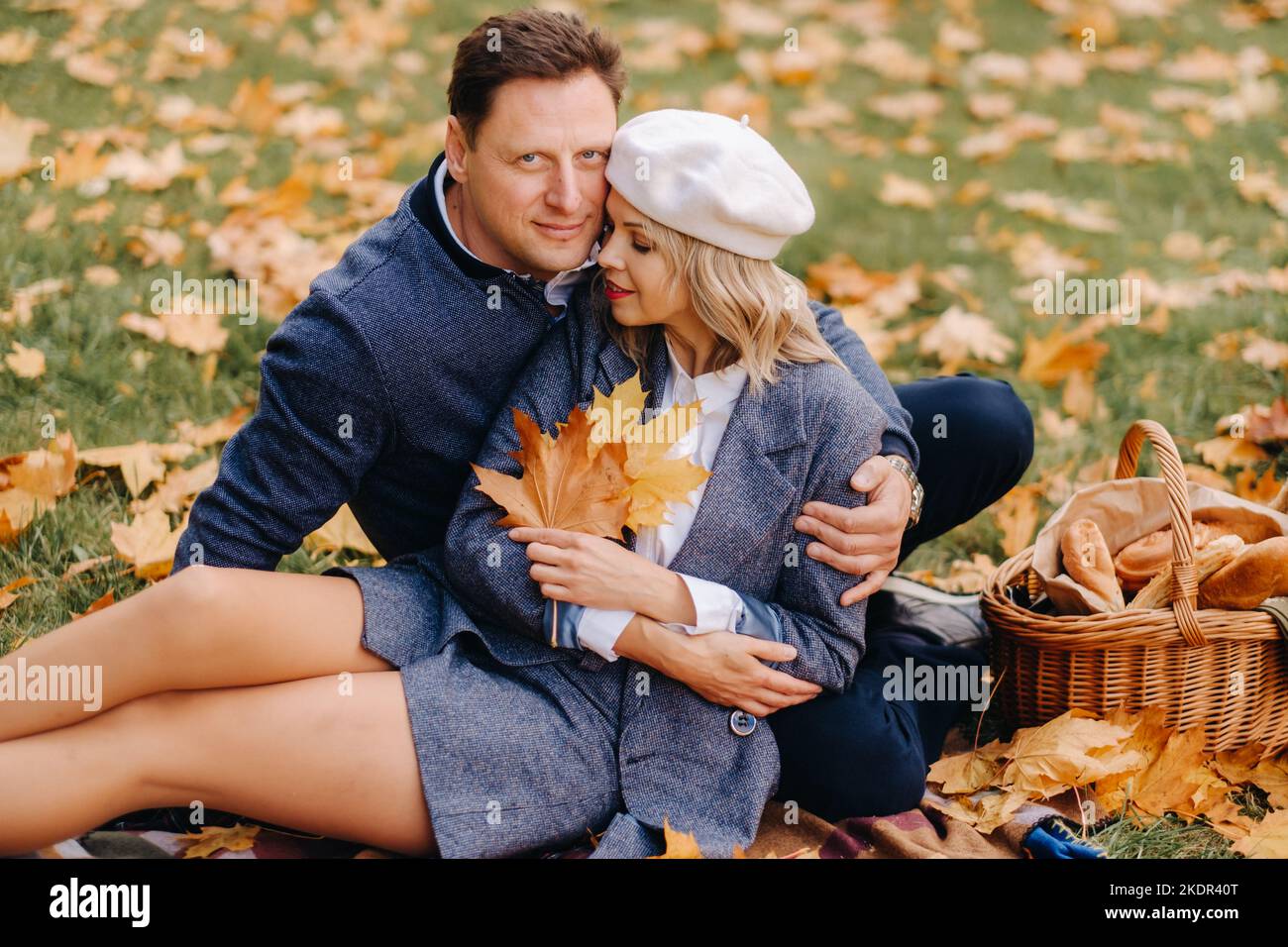 Happy couple enjoying golden autumn spring season in the park Stock ...