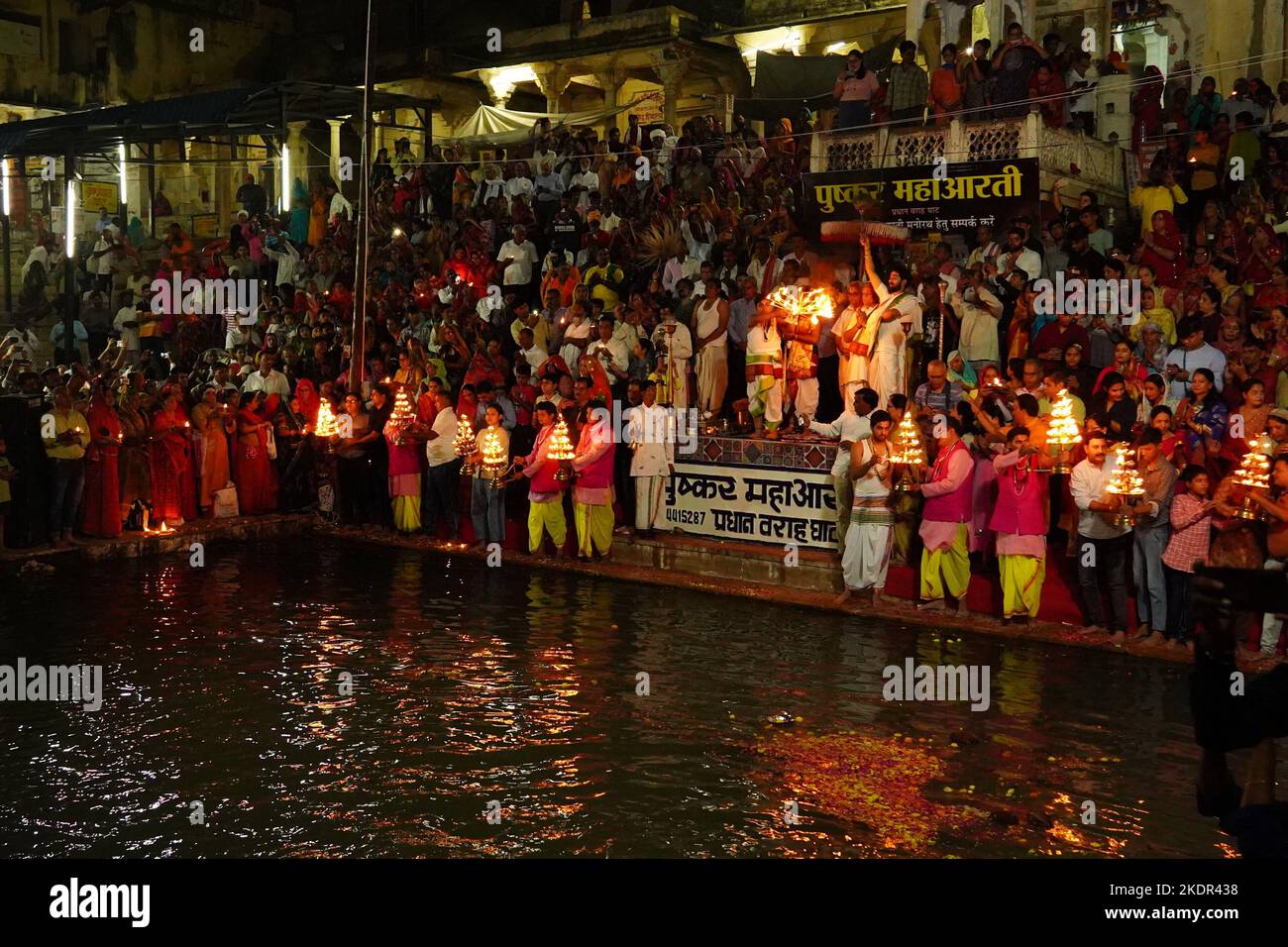 Indian Hindu devotee lights up traditional oil lamps to celebrate Dev ...