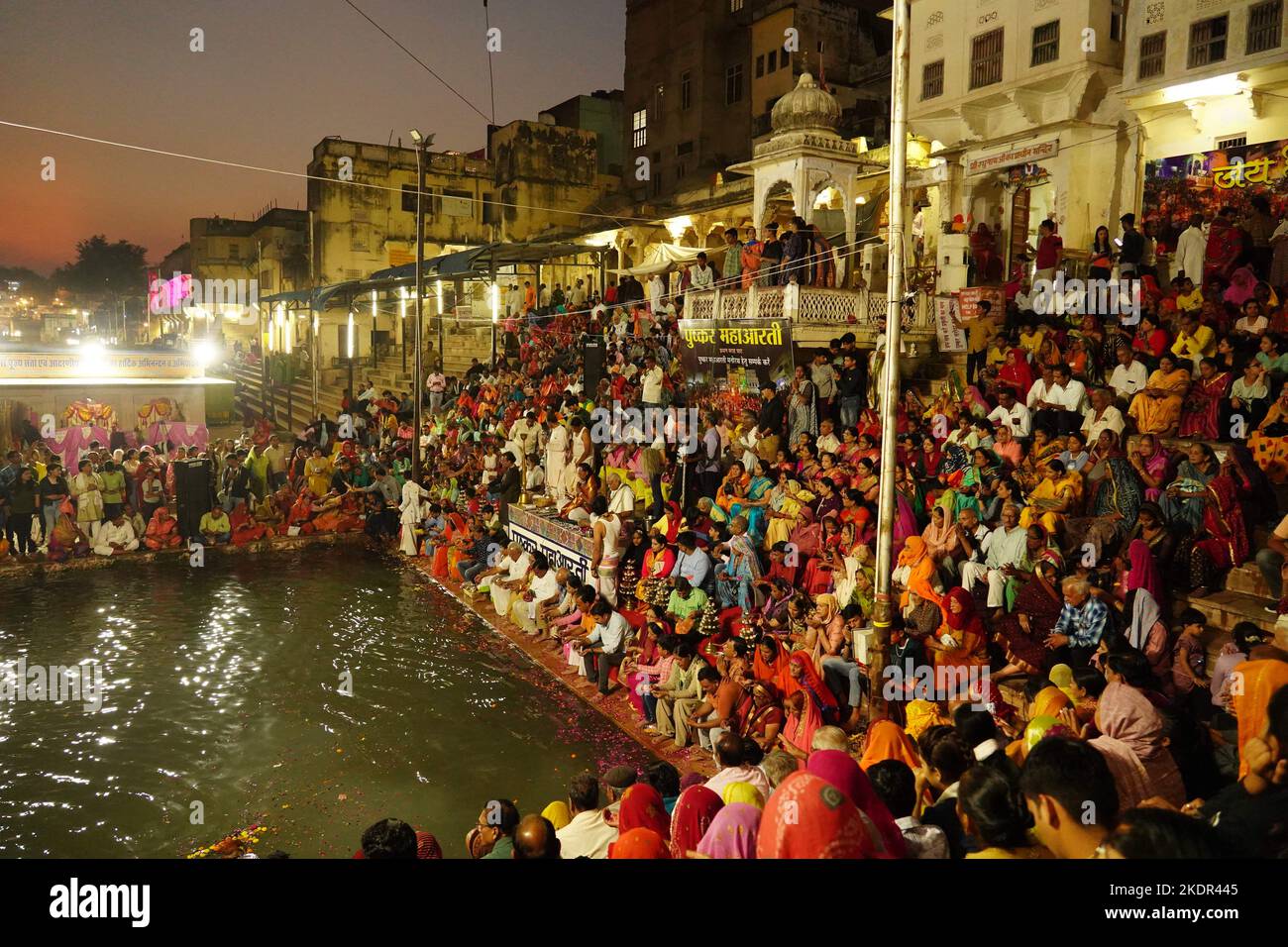 Indian Hindu devotee lights up traditional oil lamps to celebrate Dev ...