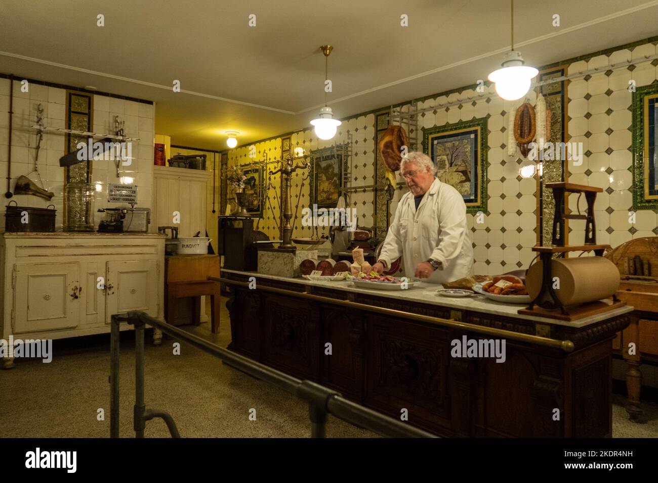 Den Helder, Netherlands. October 2022. A butcher in an old butcher shop ...