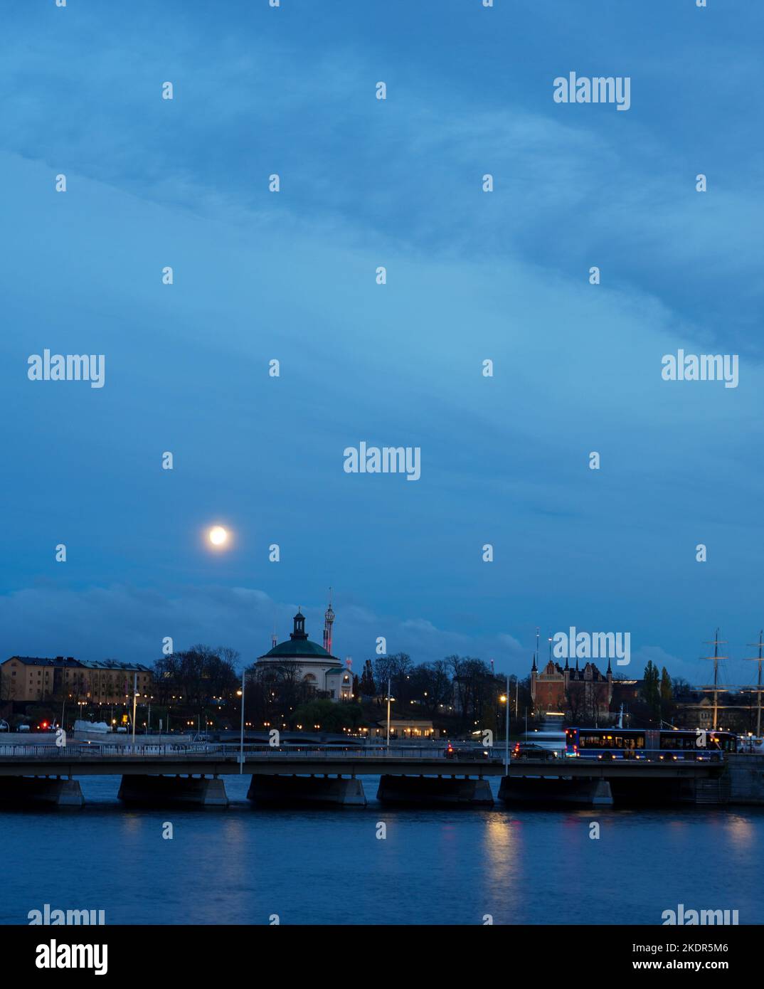 Scenic view of river against sky at night Stock Photo - Alamy