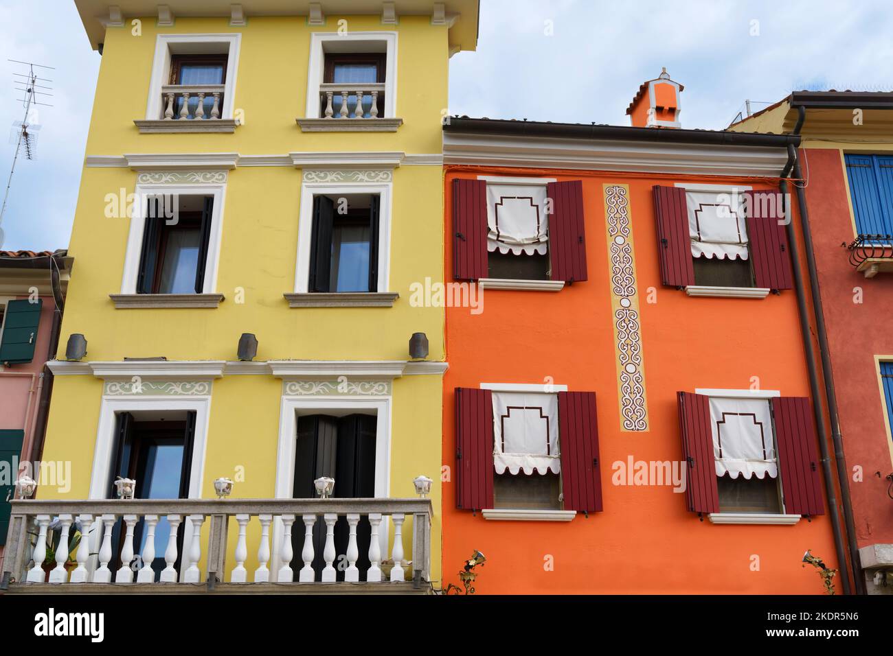 Typical colorful houses of Caorle, in Venice province, Veneto, Italy ...