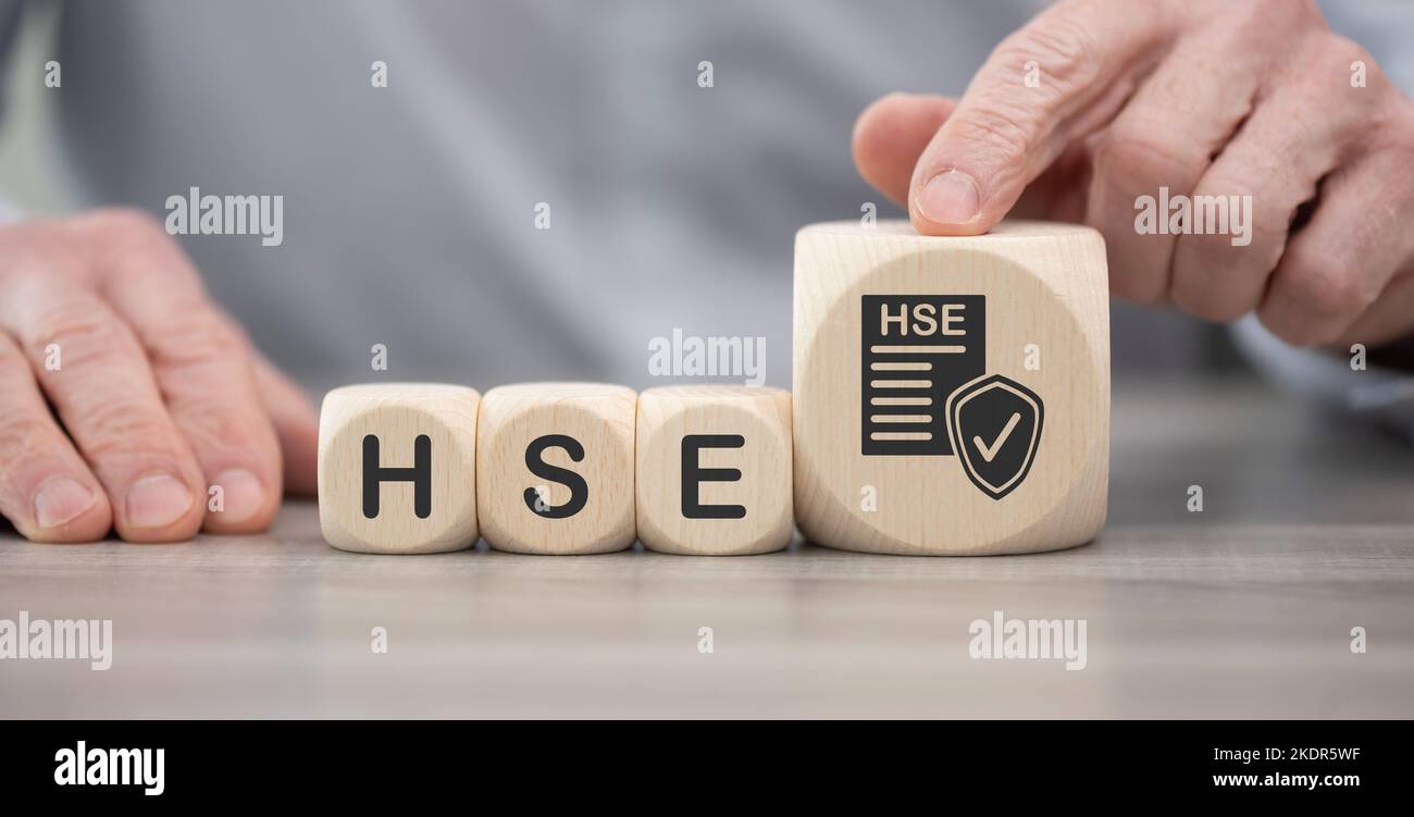 Wooden blocks with symbol of hse concept Stock Photo - Alamy