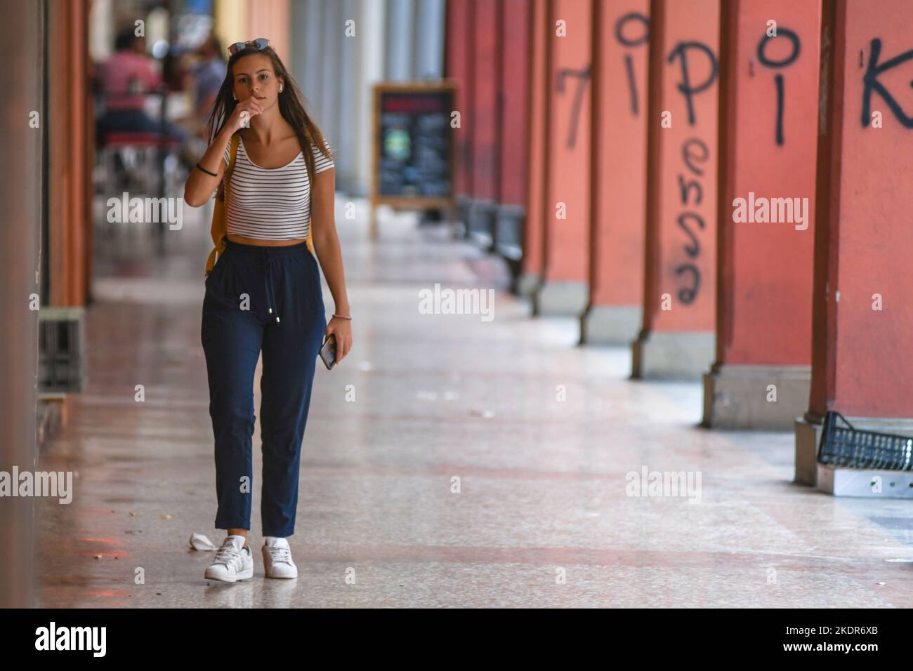 Italian young woman in Via San Felice, Bologna, Italy Stock Photo - Alamy