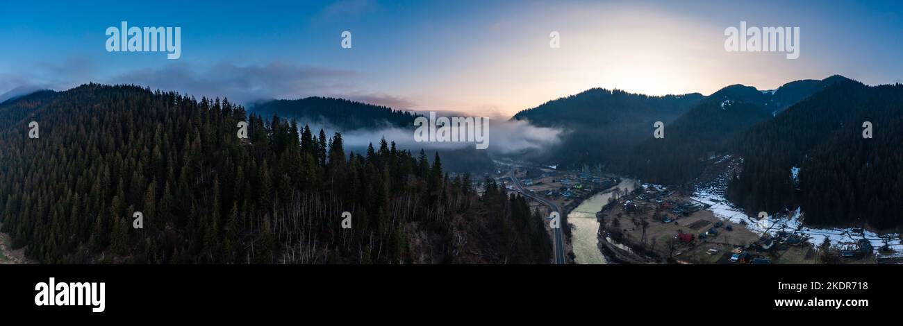 A top view of winter Vorokhta in the Carpathians of Ukraine, a river ...