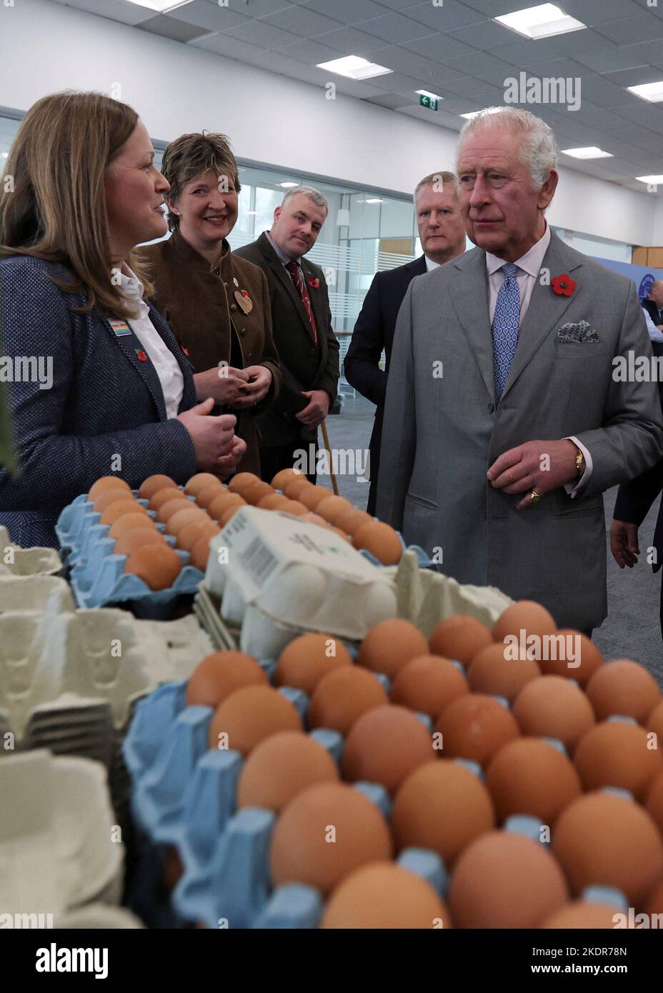 King Charles III speaks to staff and suppliers during a visit to the ...