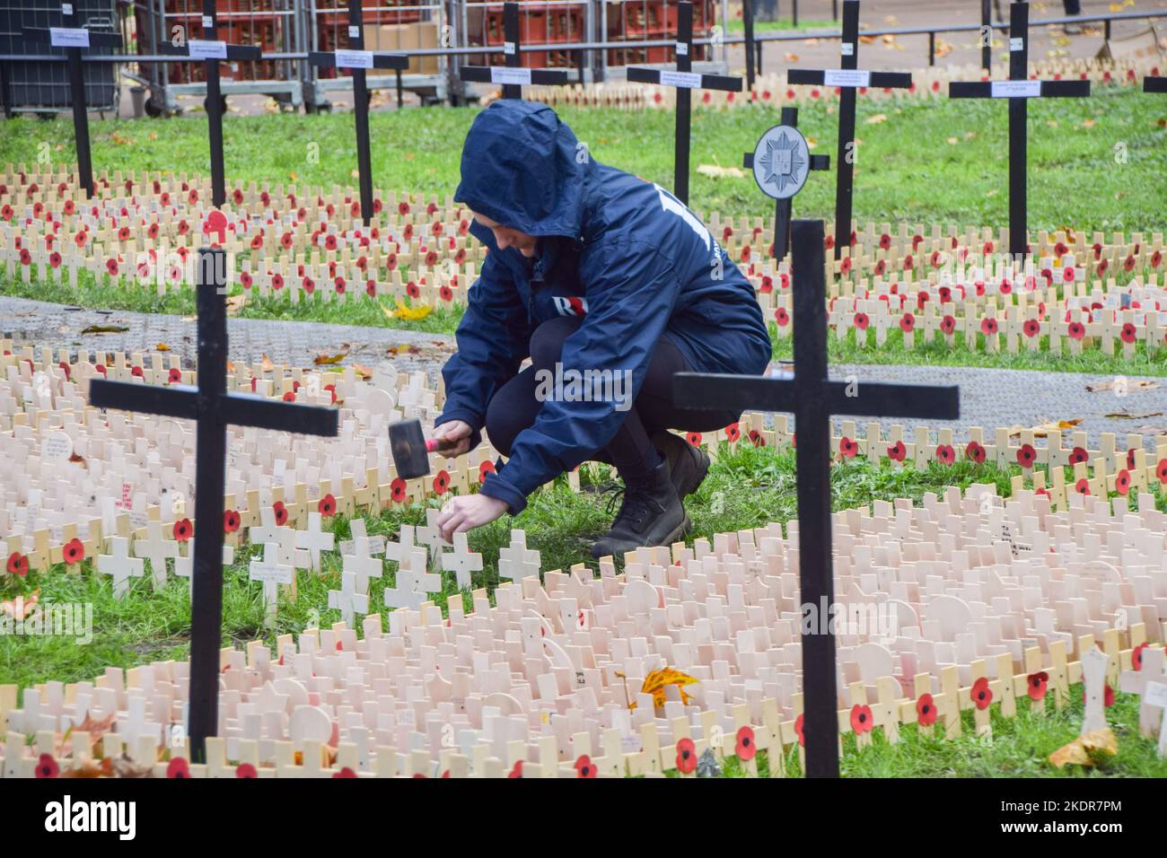 London, UK. 8th November 2022. Volunteers have begun planting crosses ...