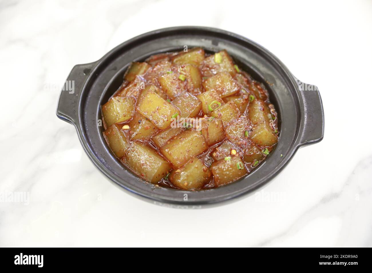 Burning stone bowl bean jelly Stock Photo - Alamy